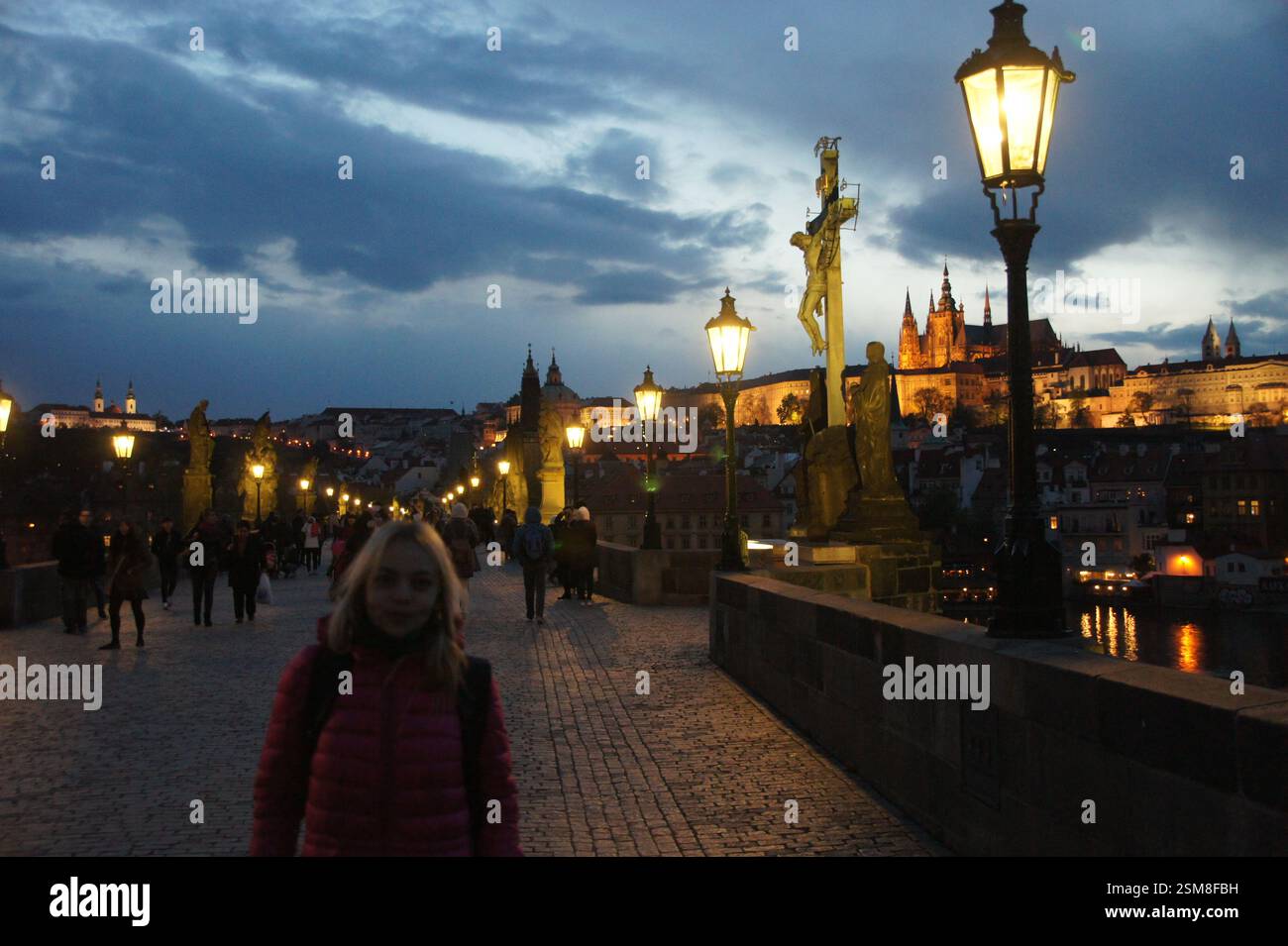 Charles Bridge is an iconic landmark spanning the Vltava River in the ...
