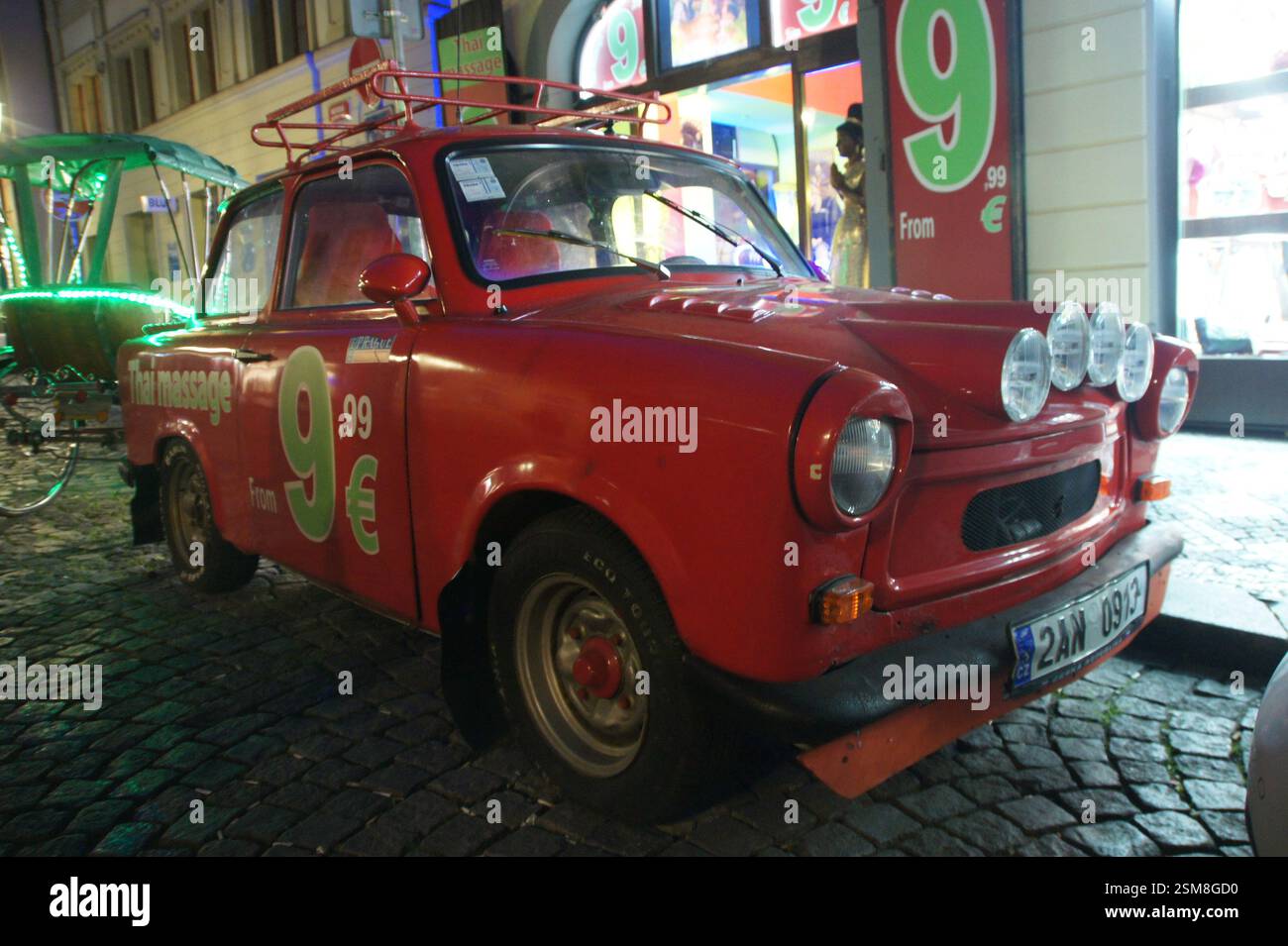 Red Trabant 601, a vintage East German car, is seen with a roof rack ...