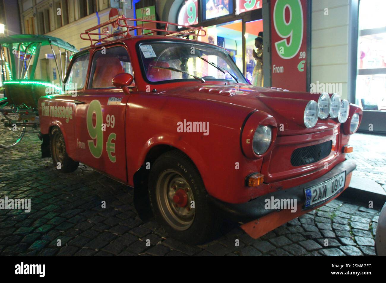 Trabant 601. Red vintage car with roof rack and extra headlights ...