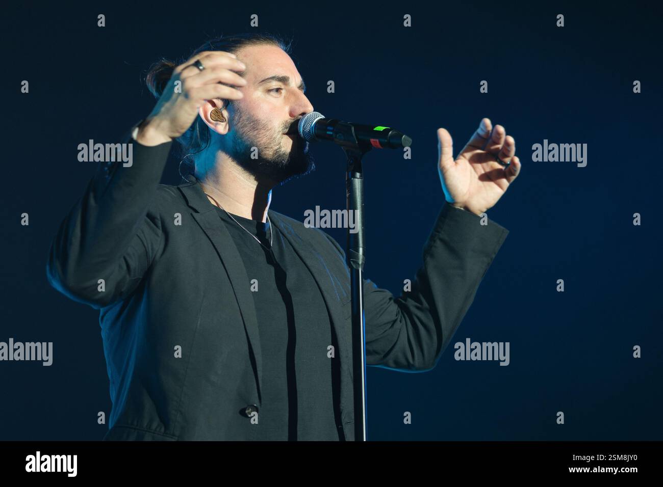 Singer-songwriter Andres Suarez performs during the tribute concert to ...