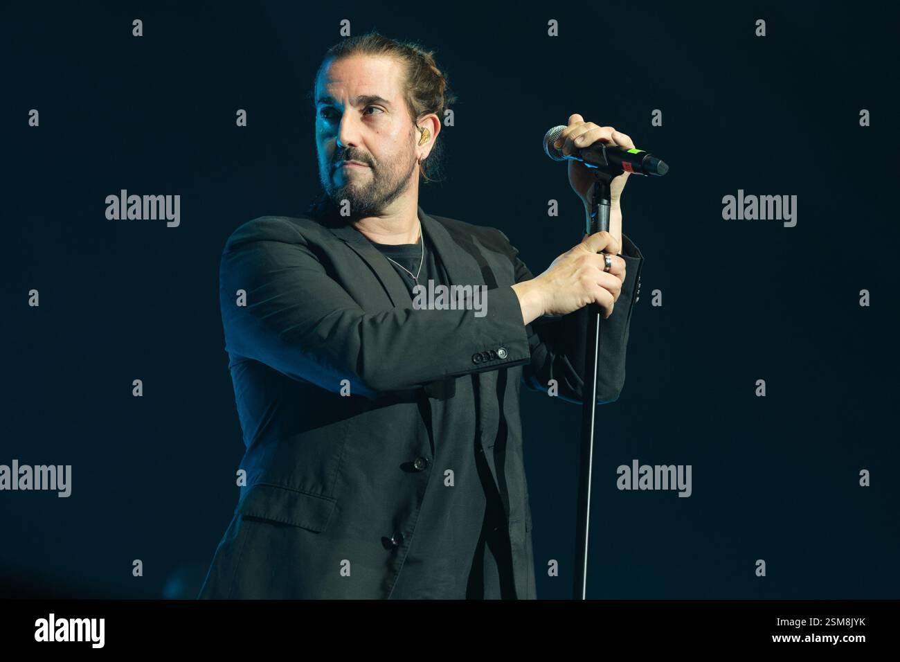 Singer-songwriter Andres Suarez performs during the tribute concert to ...