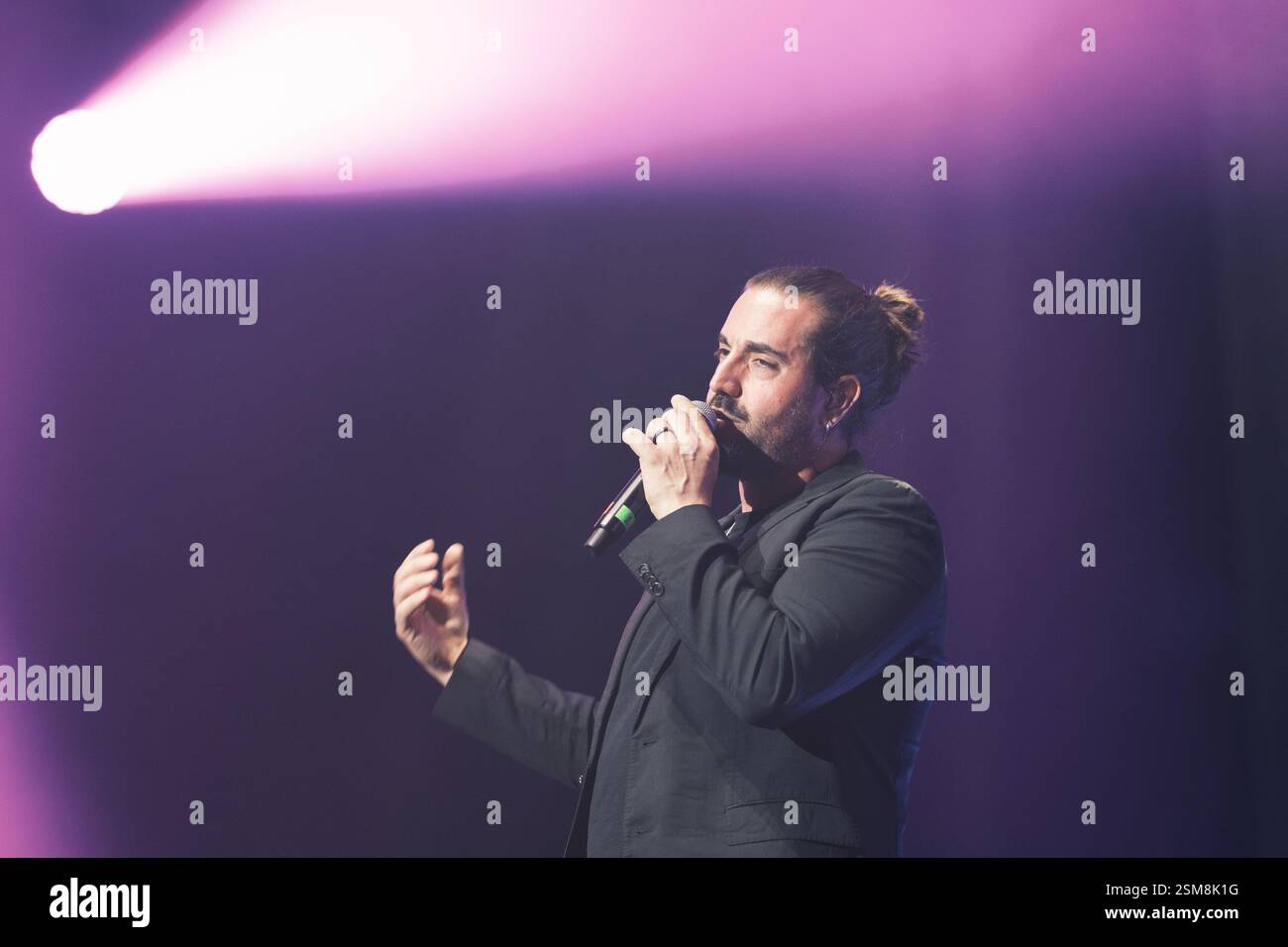 Singer-songwriter Andres Suarez performs during the tribute concert to ...