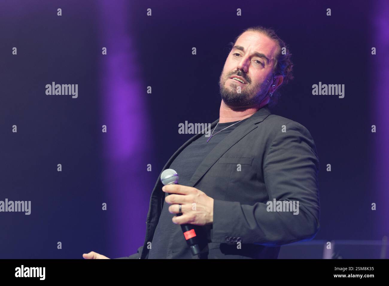 Singer-songwriter Andres Suarez performs during the tribute concert to ...