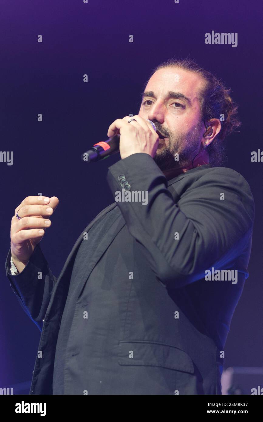 Singer-songwriter Andres Suarez performs during the tribute concert to ...