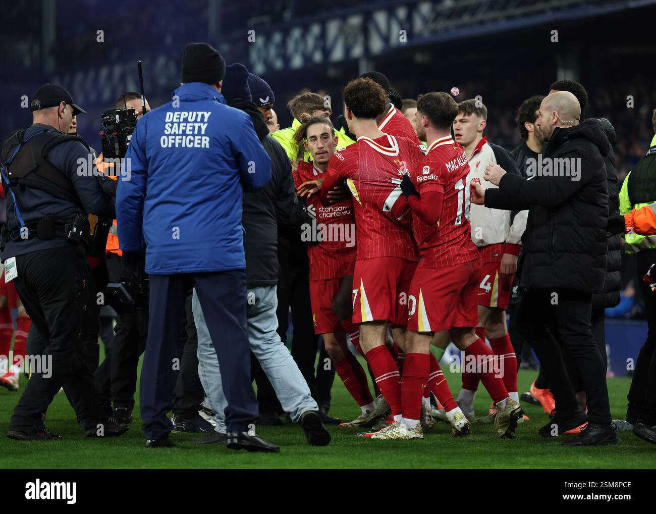 Liverpool, UK. 12th Feb, 2025. Abdoulaye Doucoure of Everton argues ...