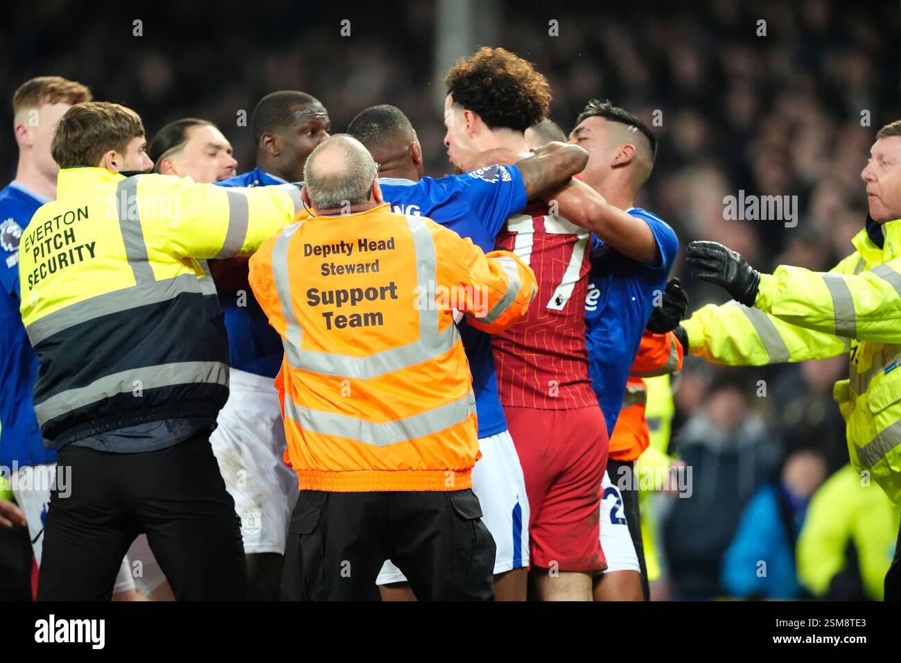 Liverpool's Curtis Jones (centre) and Everton's Abdoulaye Doucoure are ...