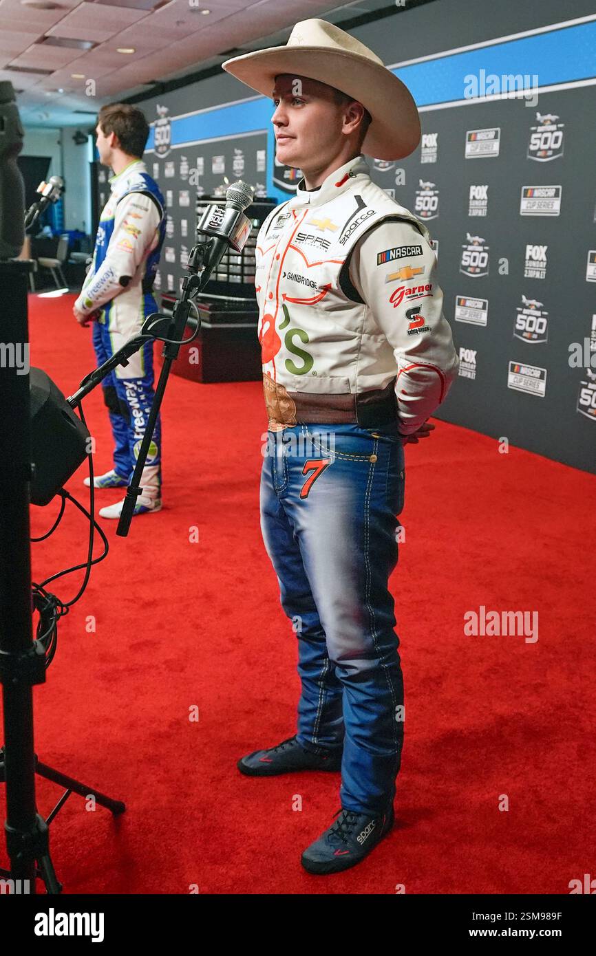 Justin Haley, wearing a driving suit resembling a cowboy shirt and ...