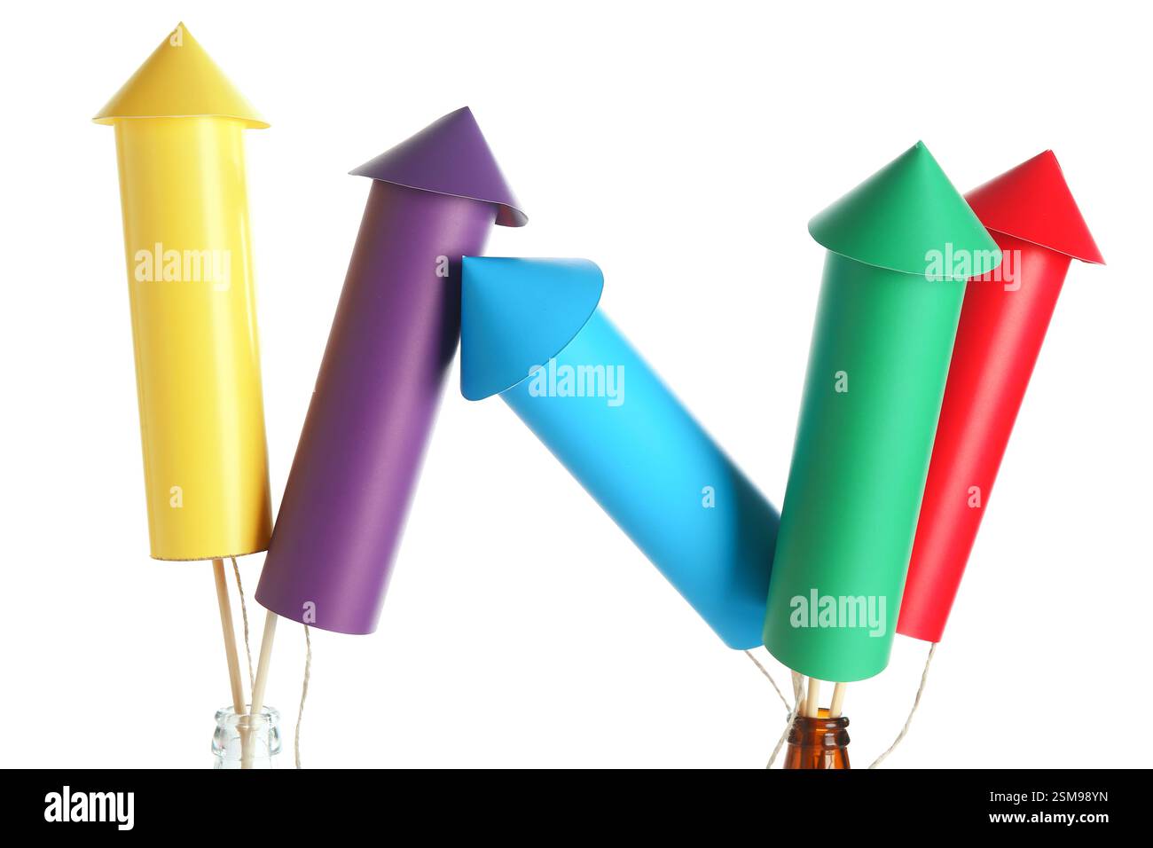 Bottles with colorful firework rockets on white background Stock Photo ...