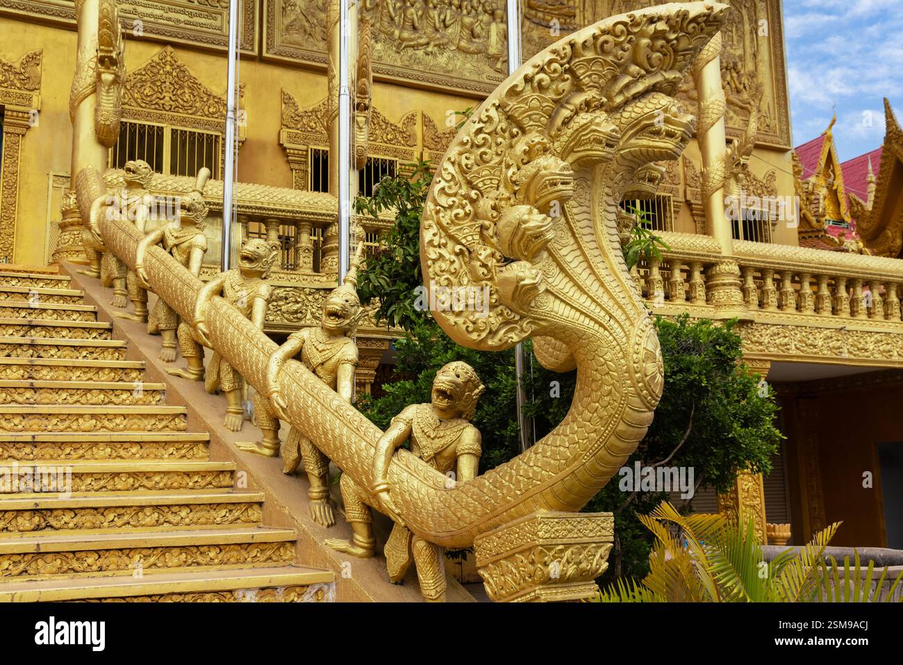 Many asura demon statues holding Naga snake statue, Wat Kean Kleang ...