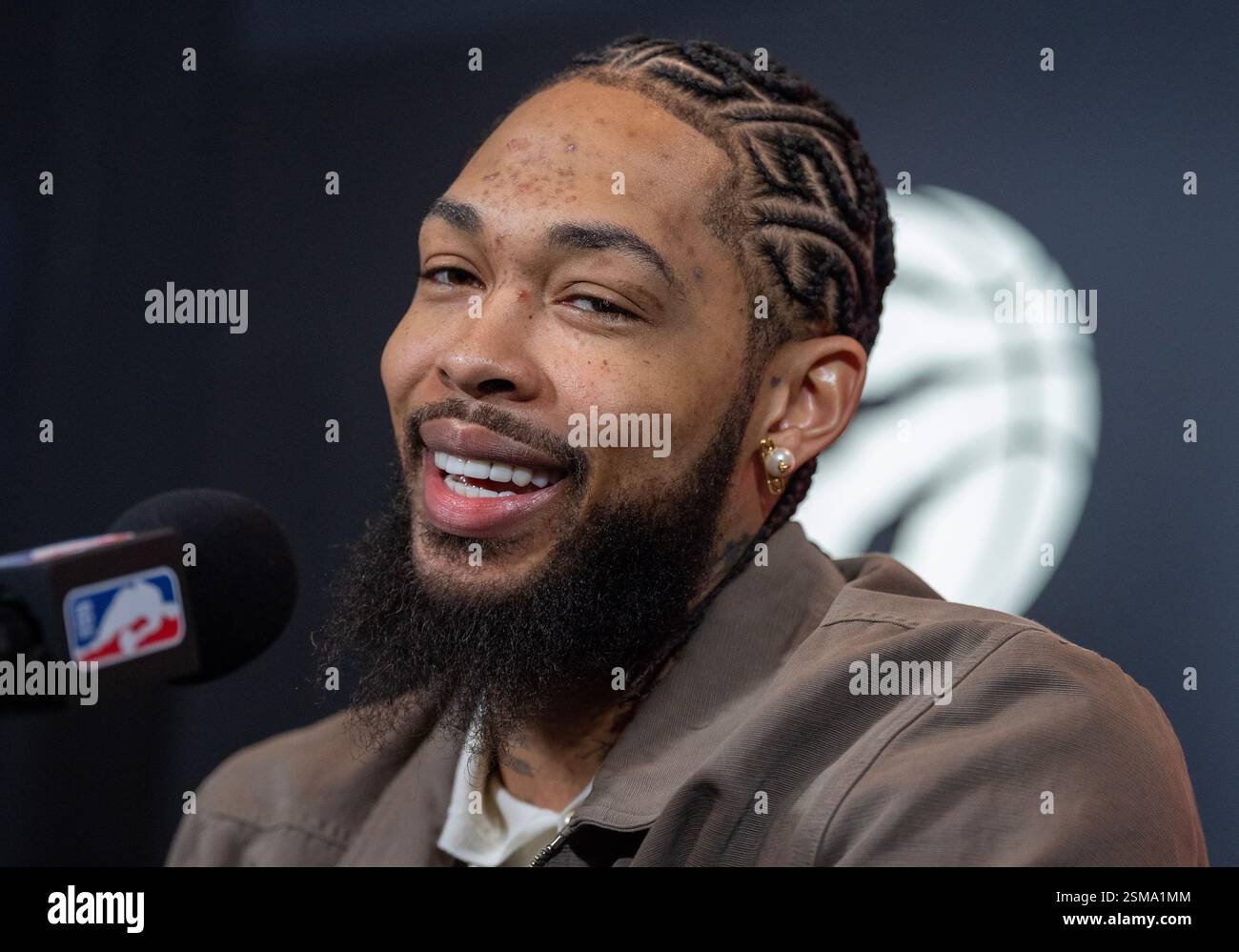 Toronto, Canada. 12th Feb, 2025. Toronto Raptors Brandon Ingram smiles ...