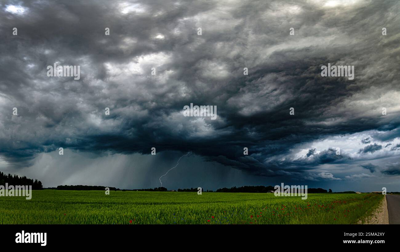 Storm clouds over field, tornadic supercell, extreme weather, dangerous ...