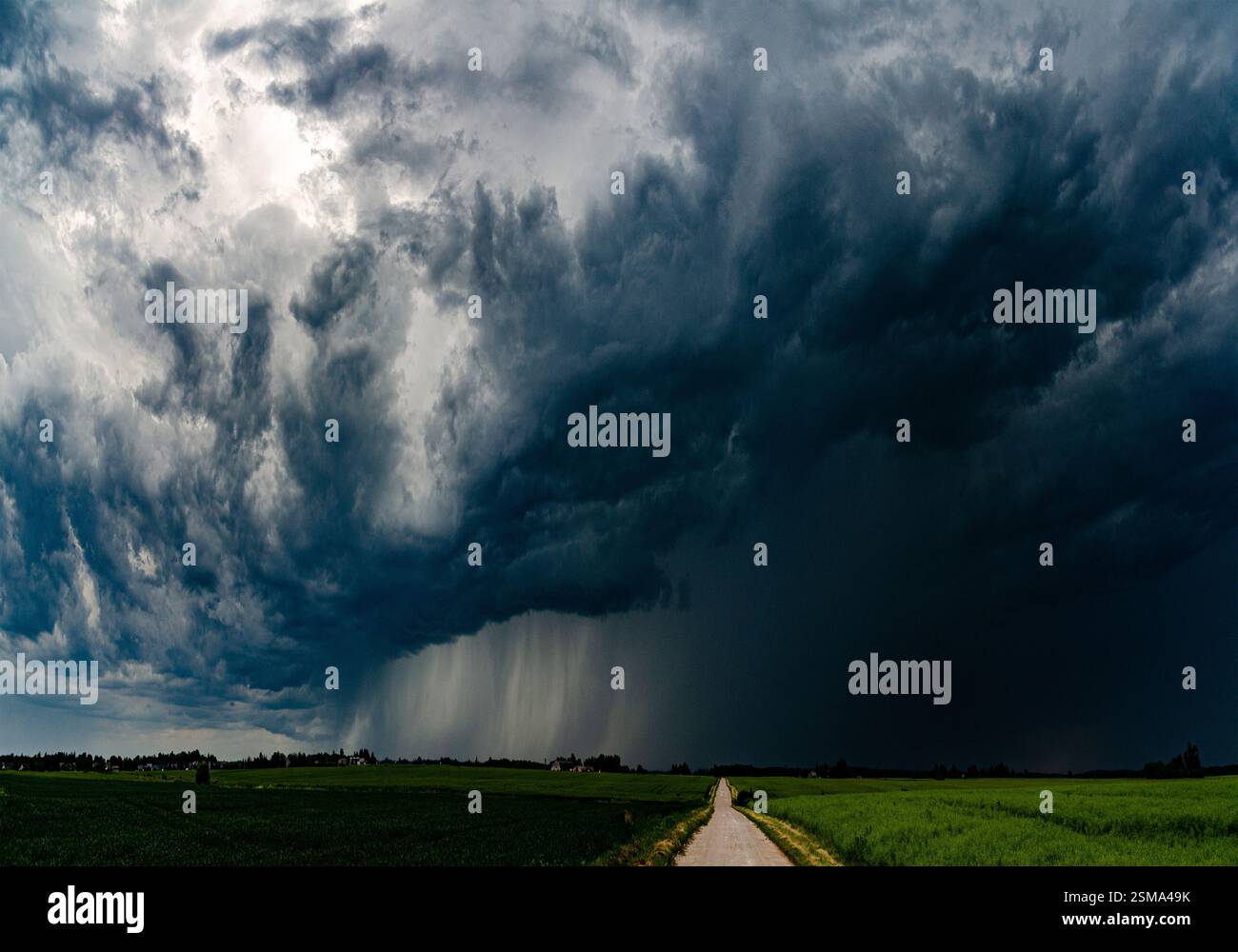 Storm clouds over field, tornadic supercell, extreme weather, dangerous ...