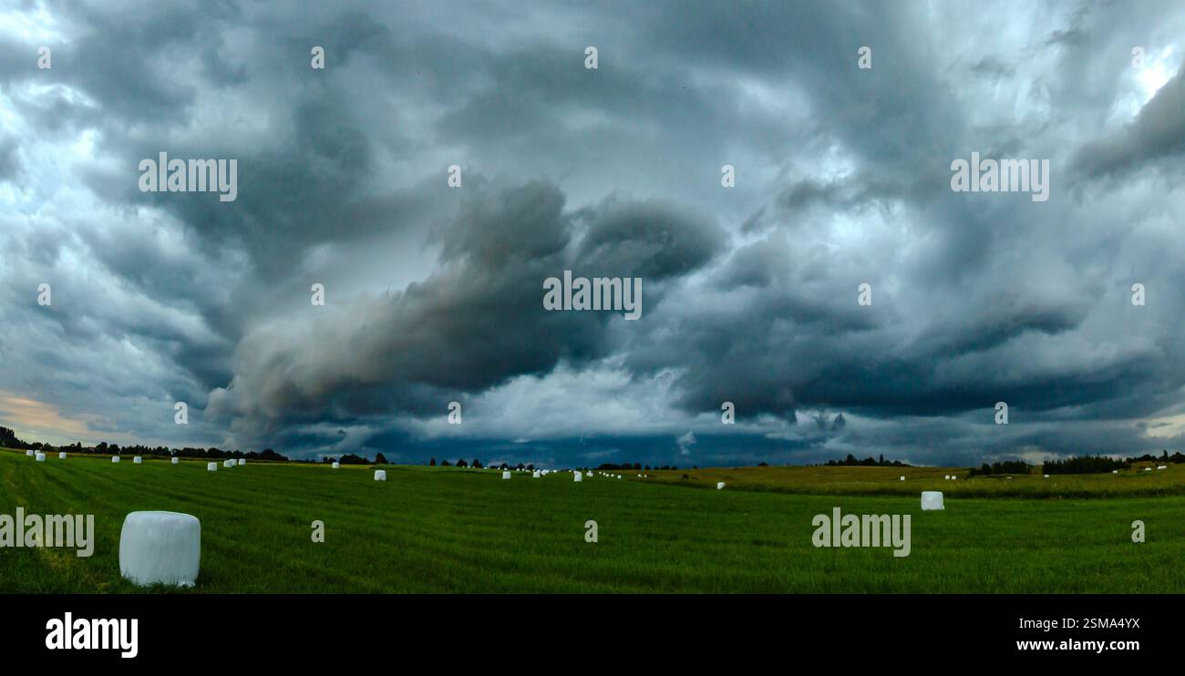 Storm clouds over field, tornadic supercell, extreme weather, dangerous ...