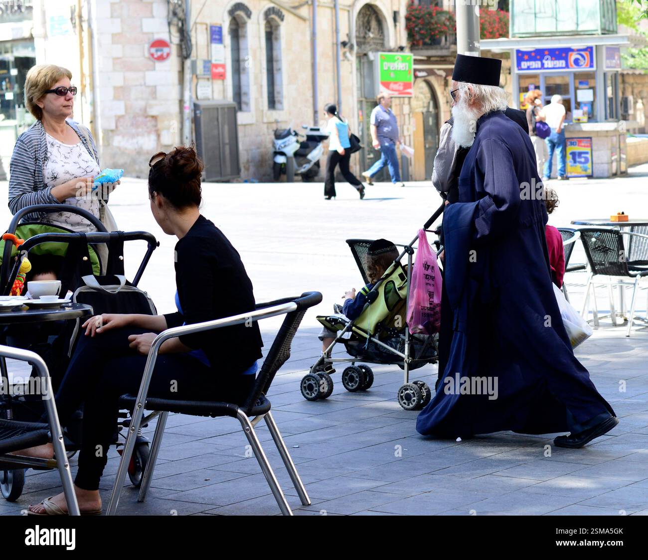 An Orthodox priest walking on Jaffa street in Jerusalem, Israel Stock ...