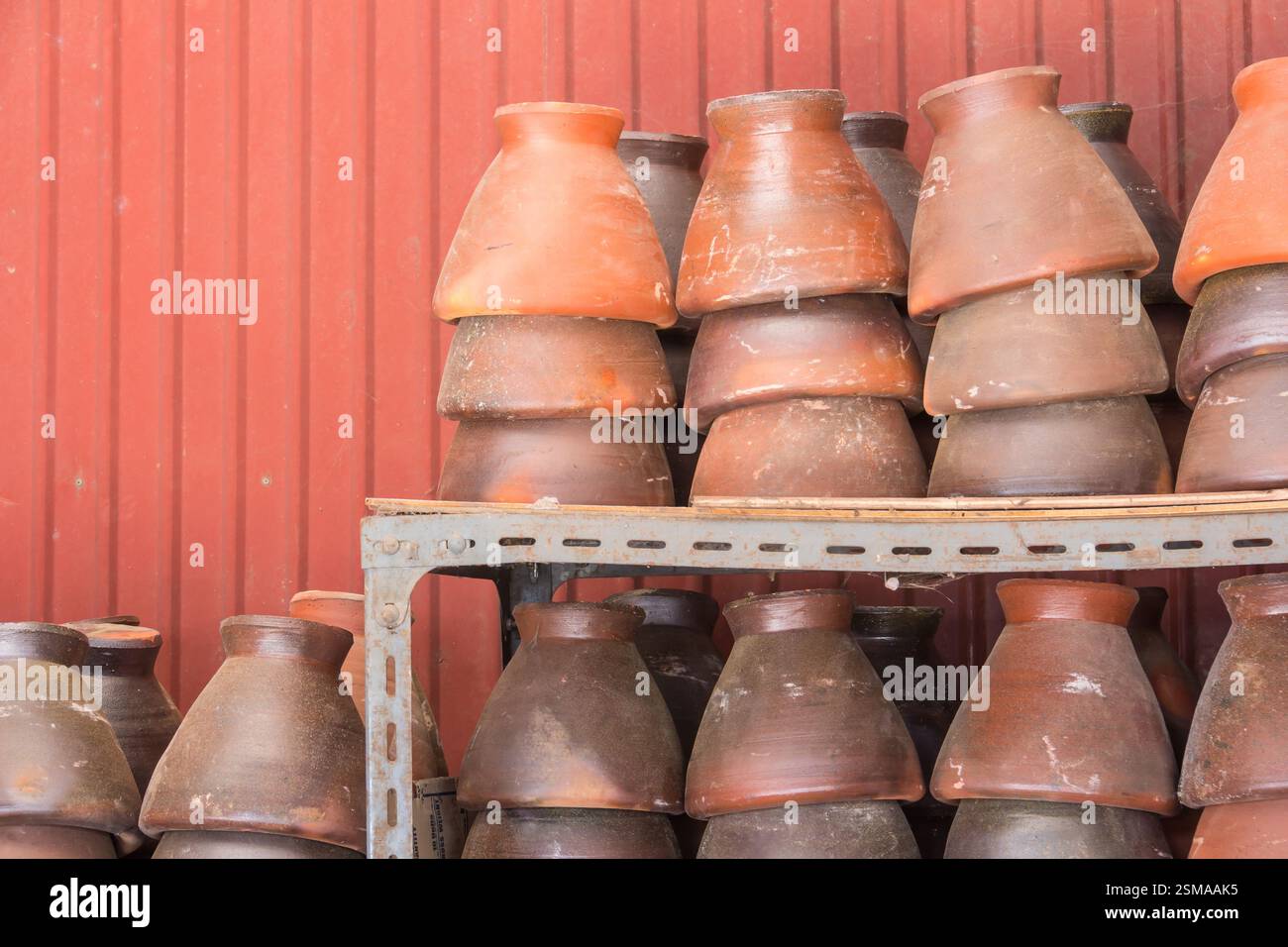 Clay mortar placed on the market Stock Photo - Alamy