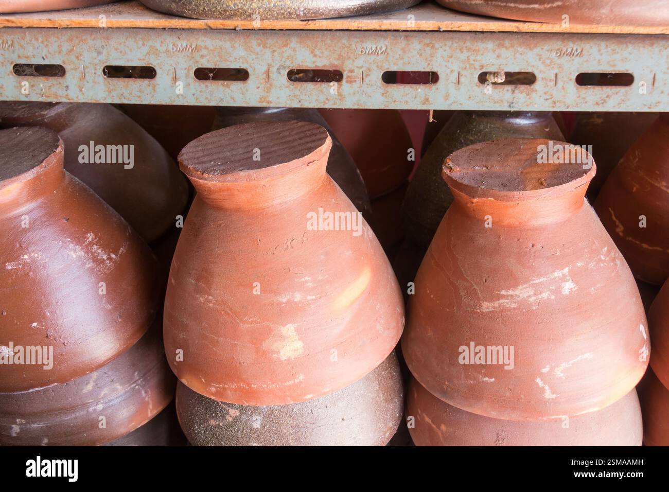 Clay mortar placed on the market Stock Photo - Alamy