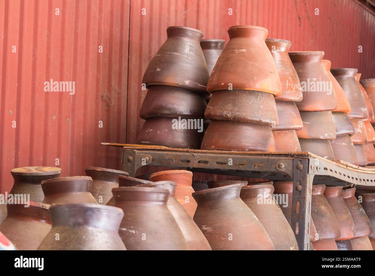 Clay mortar placed on the market Stock Photo - Alamy