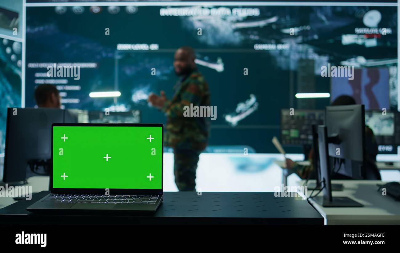 Army IT expert in control center collecting real time battlefield data ...
