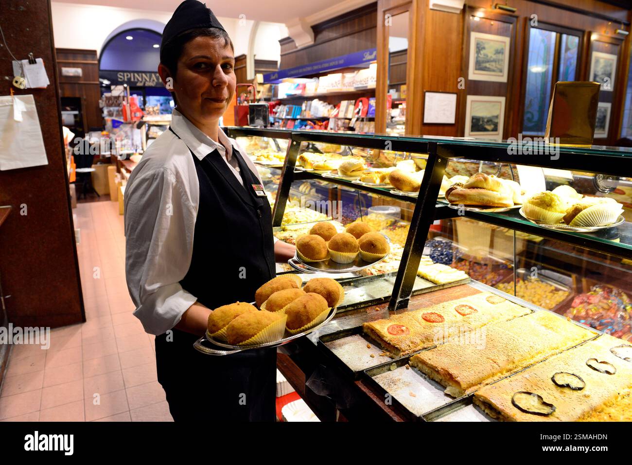 Crispy golden Arancini served at the Spinnato pasticceria in Palermo ...