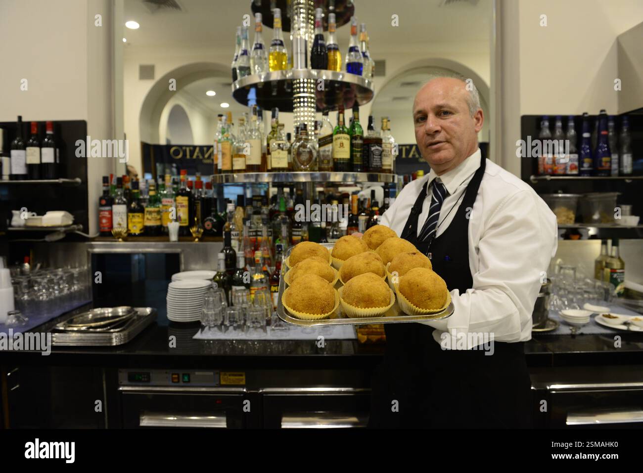 Crispy golden Arancini served at the Spinnato pasticceria in Palermo ...