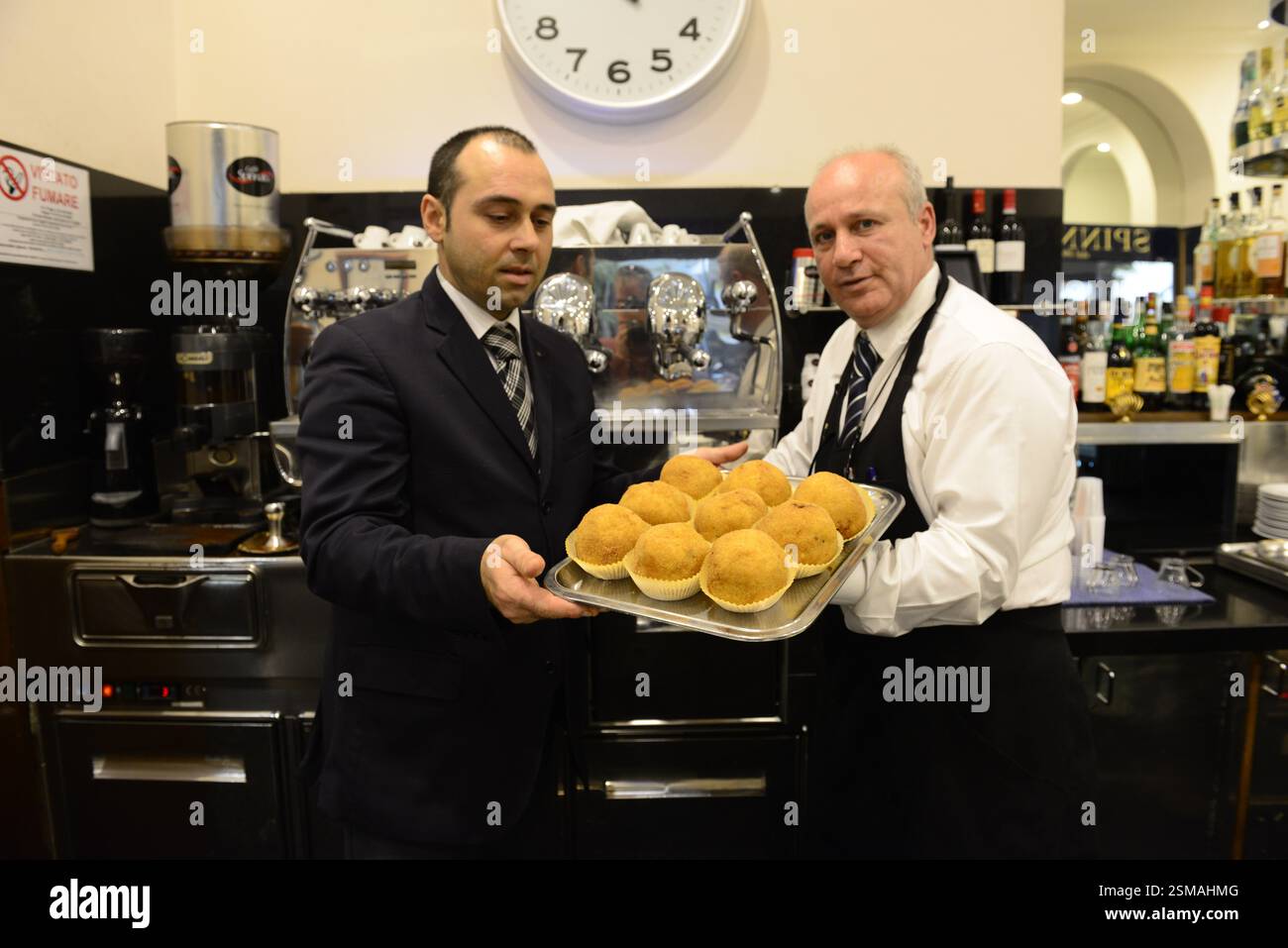 Crispy golden Arancini served at the Spinnato pasticceria in Palermo ...