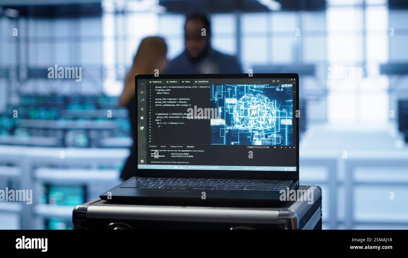Focus on notebook used by engineers in server hub in blurry background ...