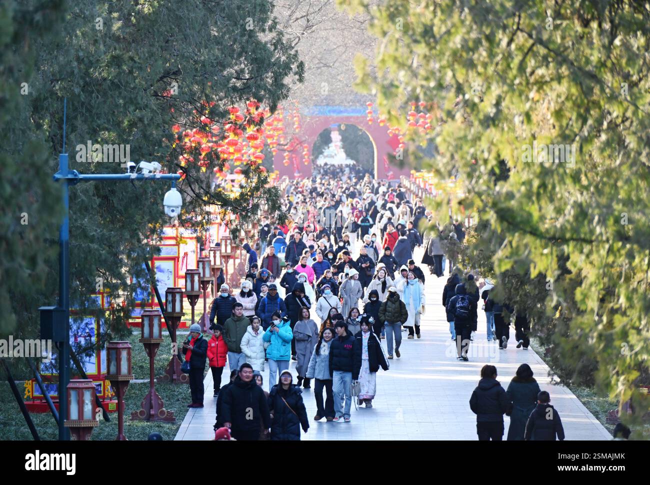 BEIJING, CHINA - FEBRUARY 12, 2025 - Tourists visit the Temple of ...
