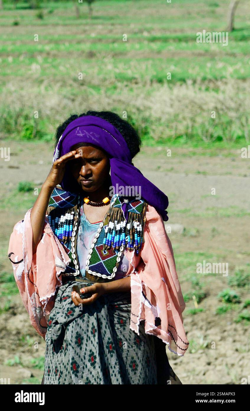 A Muslim woman dressed in traditional attire in the highlands of ...