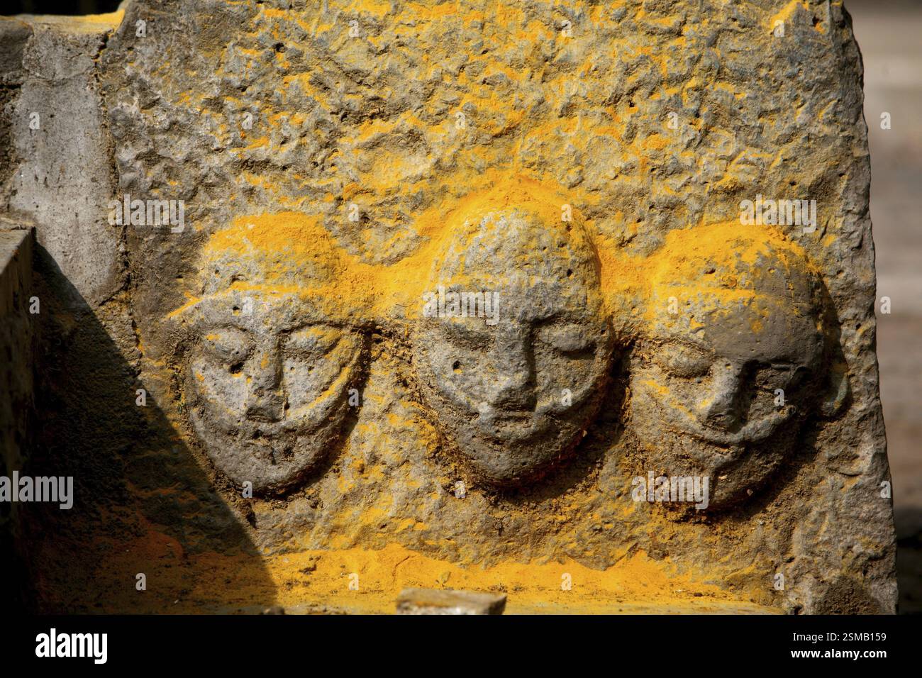 Statues immersed in turmeric powder at the Jejuri temple, Pune ...
