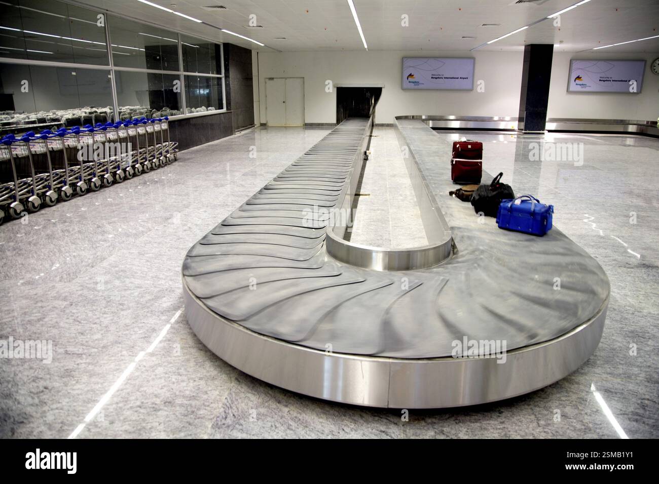 Baggage conveyor belt system area of airport trolley for passengers and ...
