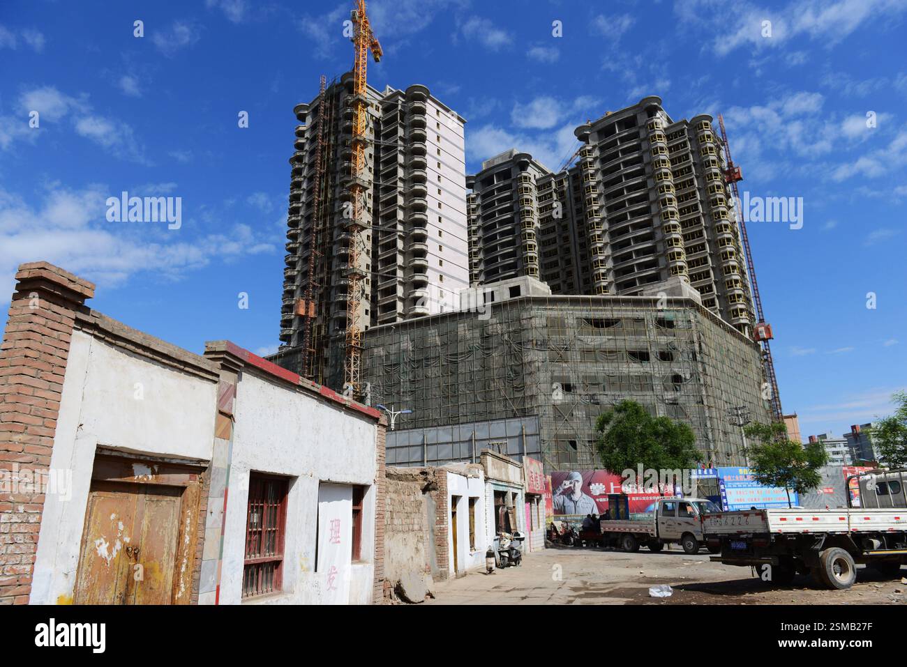 New residential buildings replace old neighborhoods in Zhangye, Gansu ...