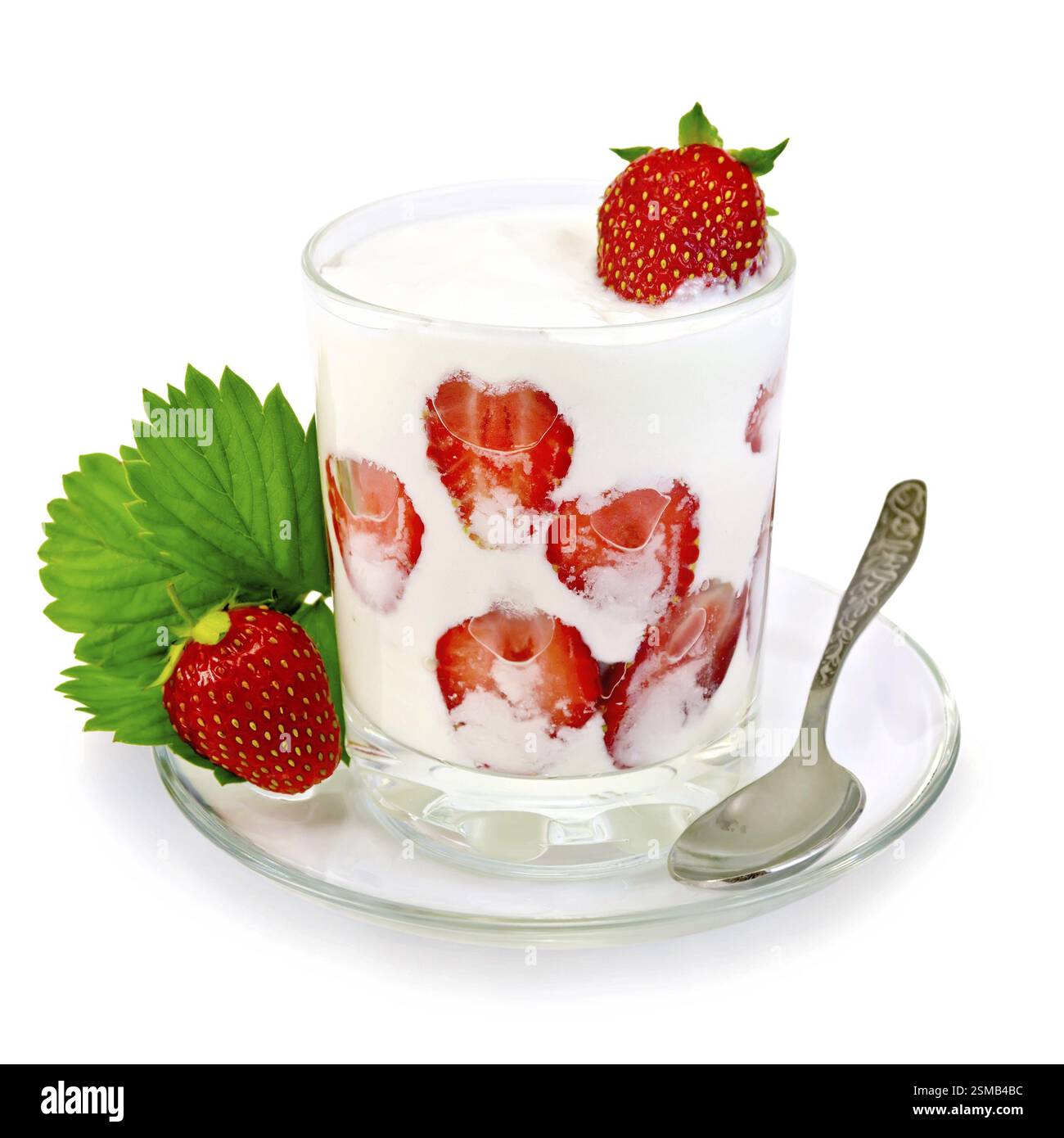 Thick yogurt with strawberries in a glass with a spoon on the saucer ...