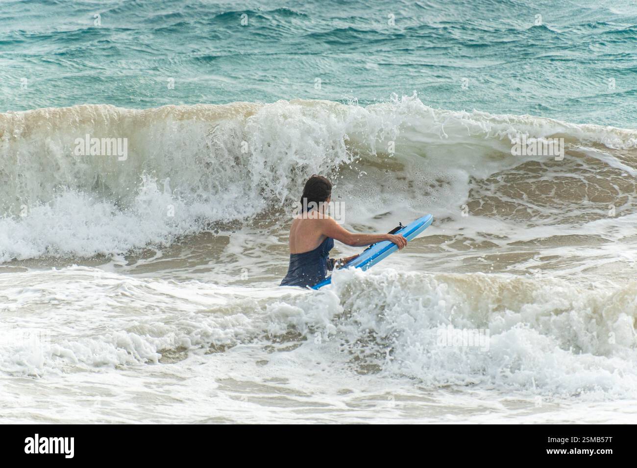 Kids with boogie board hi-res stock photography and images - Alamy
