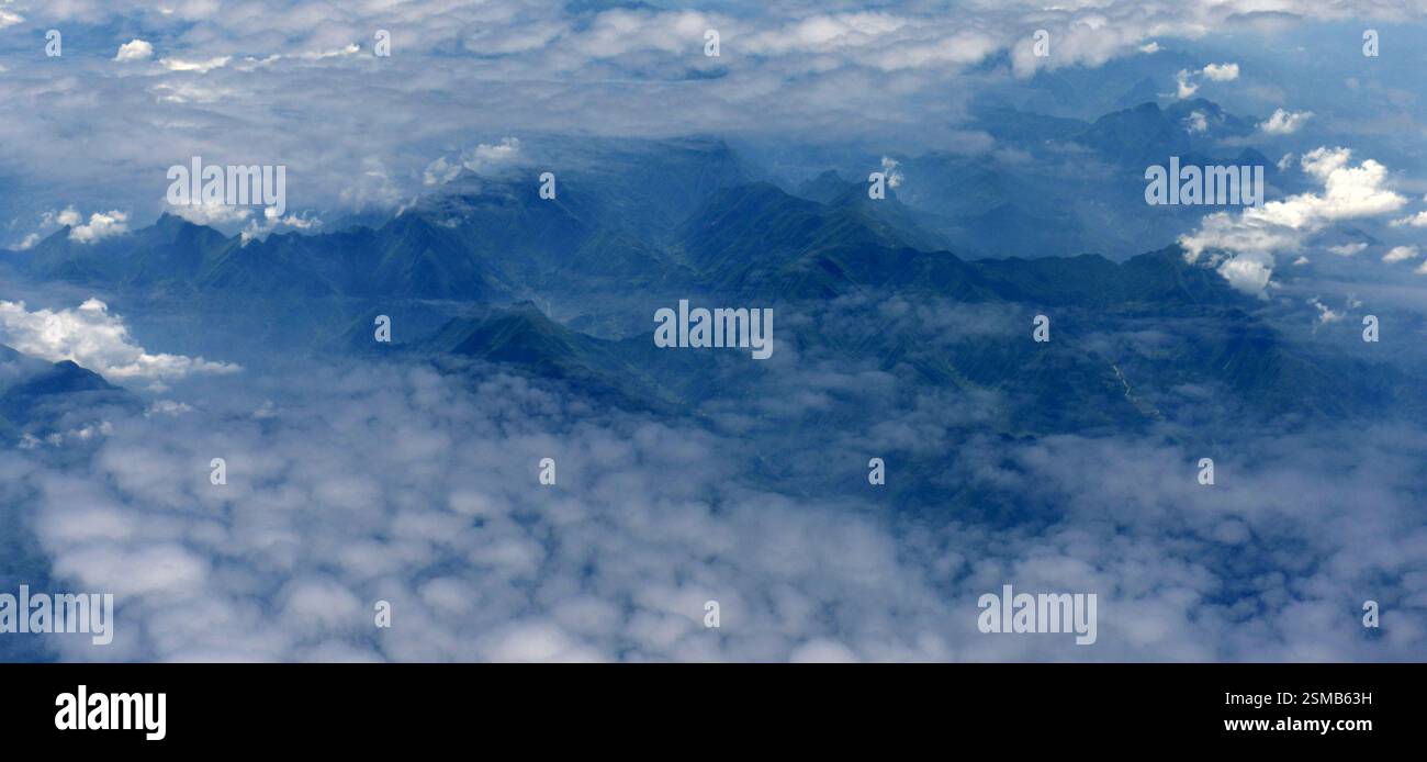 Aerial View of Endless Mountain Ranges Covered by Soft Hazy Layers ...