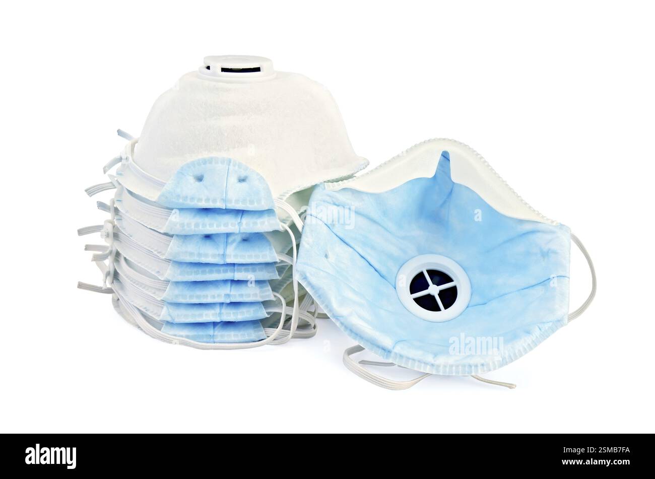 A stack of white and one detached disposable respirators with blue ...