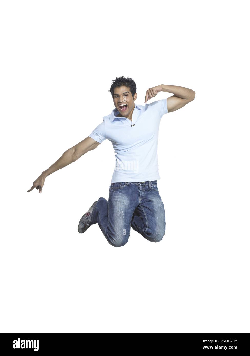 South Asian Indian man jumping with joy MR Stock Photo - Alamy