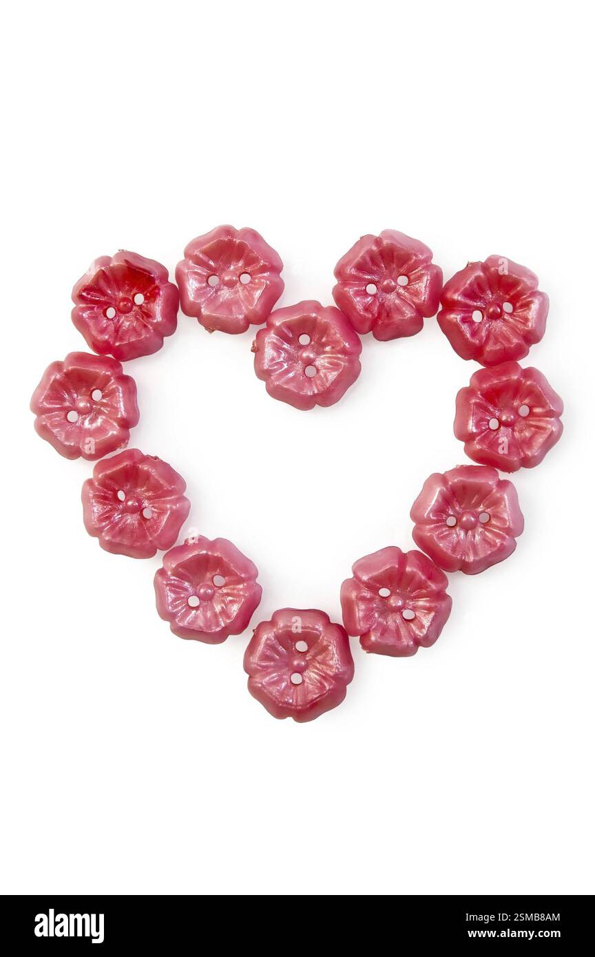 Buttons on hearts Cut Out Stock Images & Pictures - Alamy