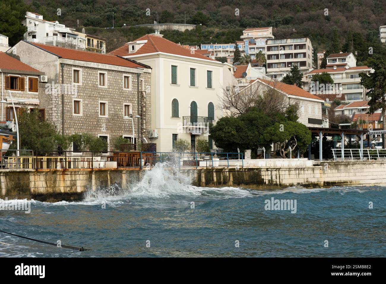 Seafront buildings in a Mediterranean historic town with stone houses ...