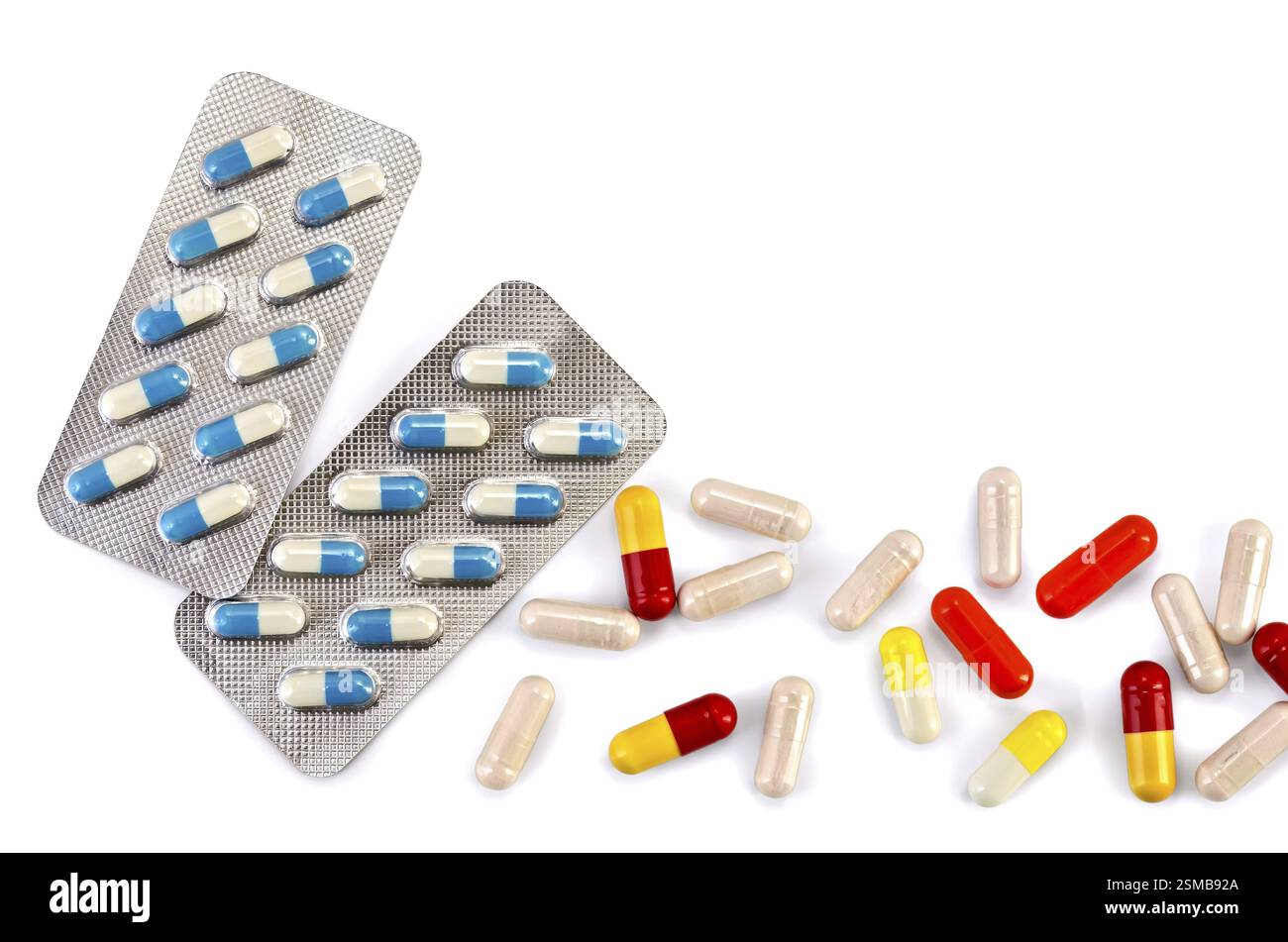 Blue capsules in two packs, capsules red, yellow and beige isolated on ...