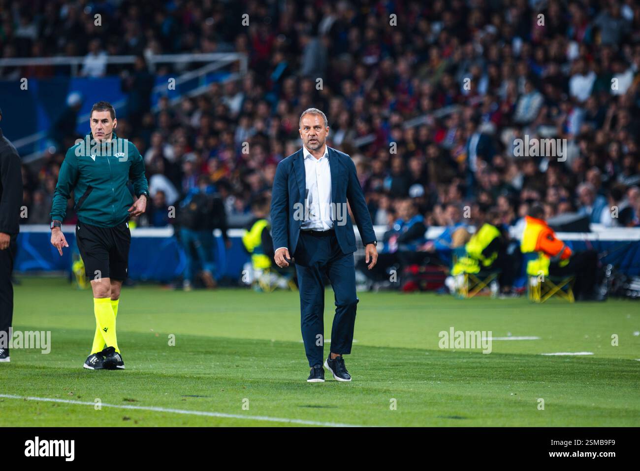 Barcelona, Spain. 23rd Oct, 2024. Hansi Flick in action during the Uefa Champions League match ...