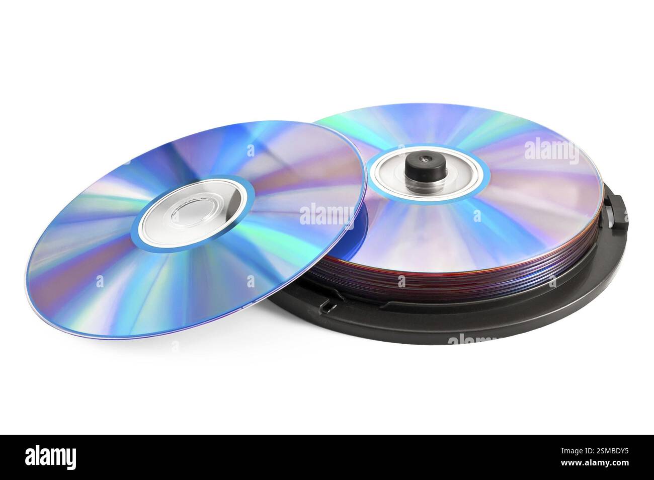 A stack of computer disks in a box and a separate drive near isolated ...