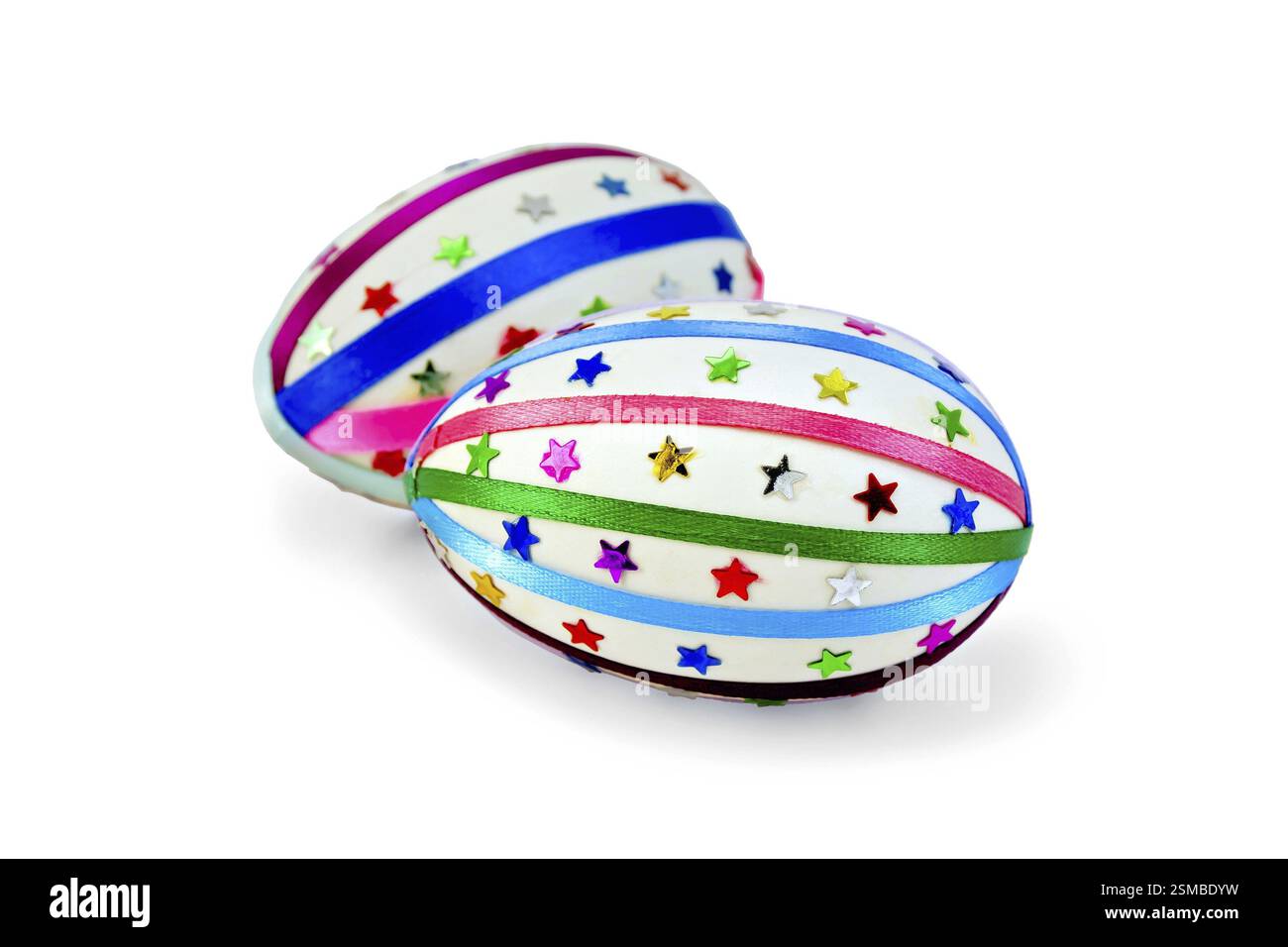 Two easter eggs, decorated with multicolored braid and sparkles in the ...