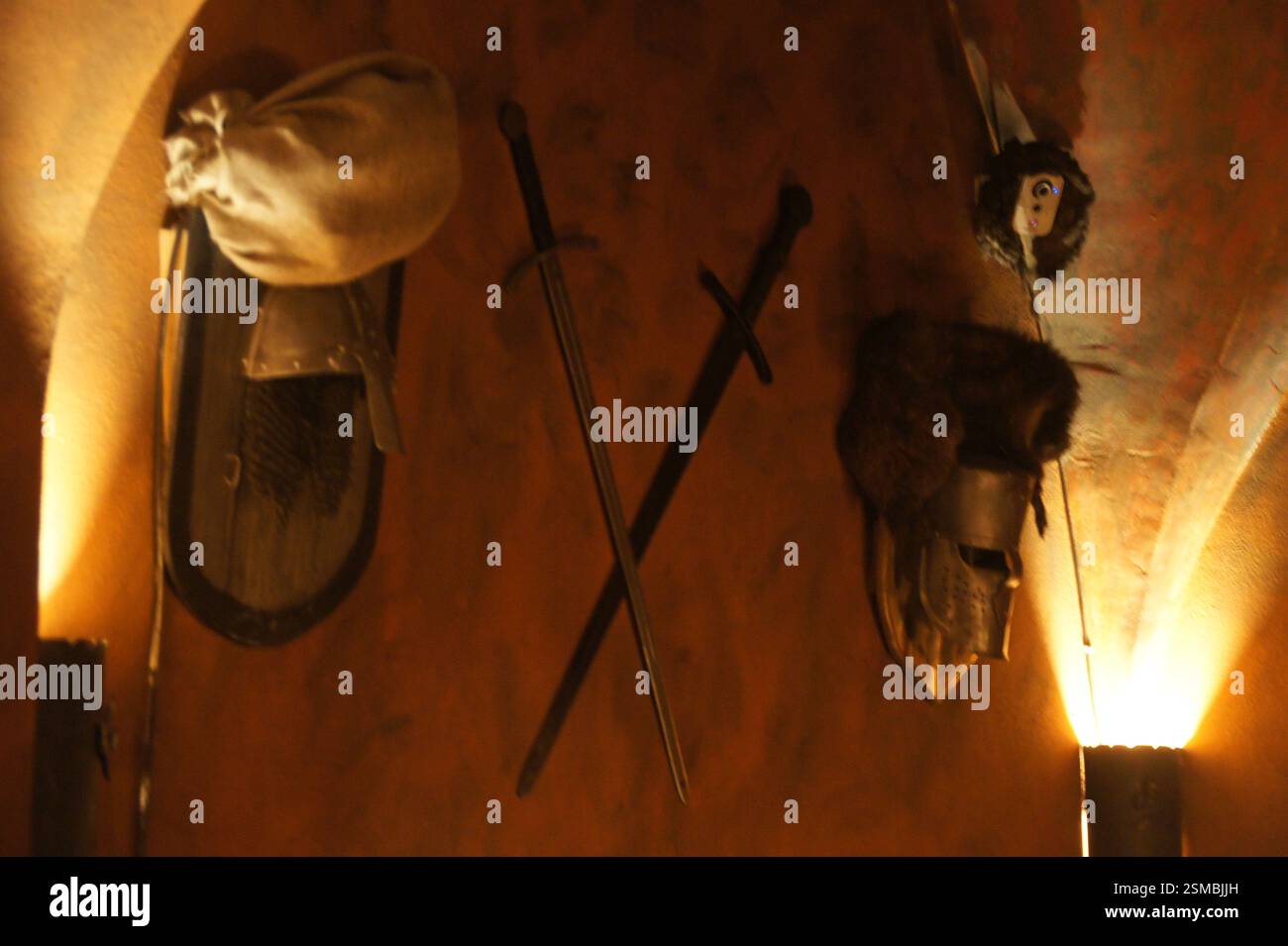 Medieval wall hanging Czech Republic. Swords crossed behind a shield ...