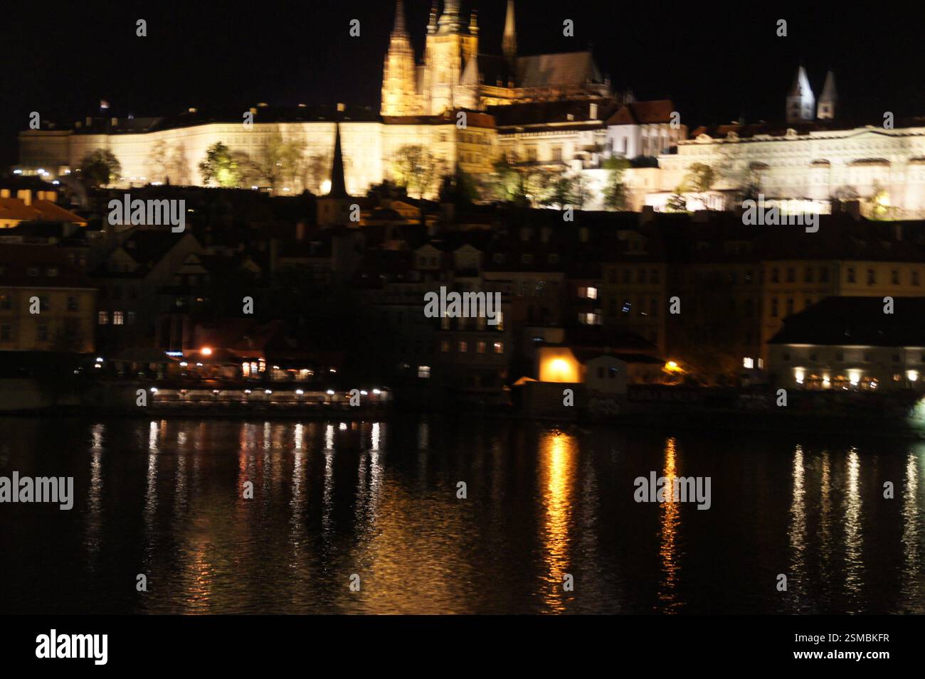 Prague Castle, a symbol of Czech history and culture, is illuminated at ...