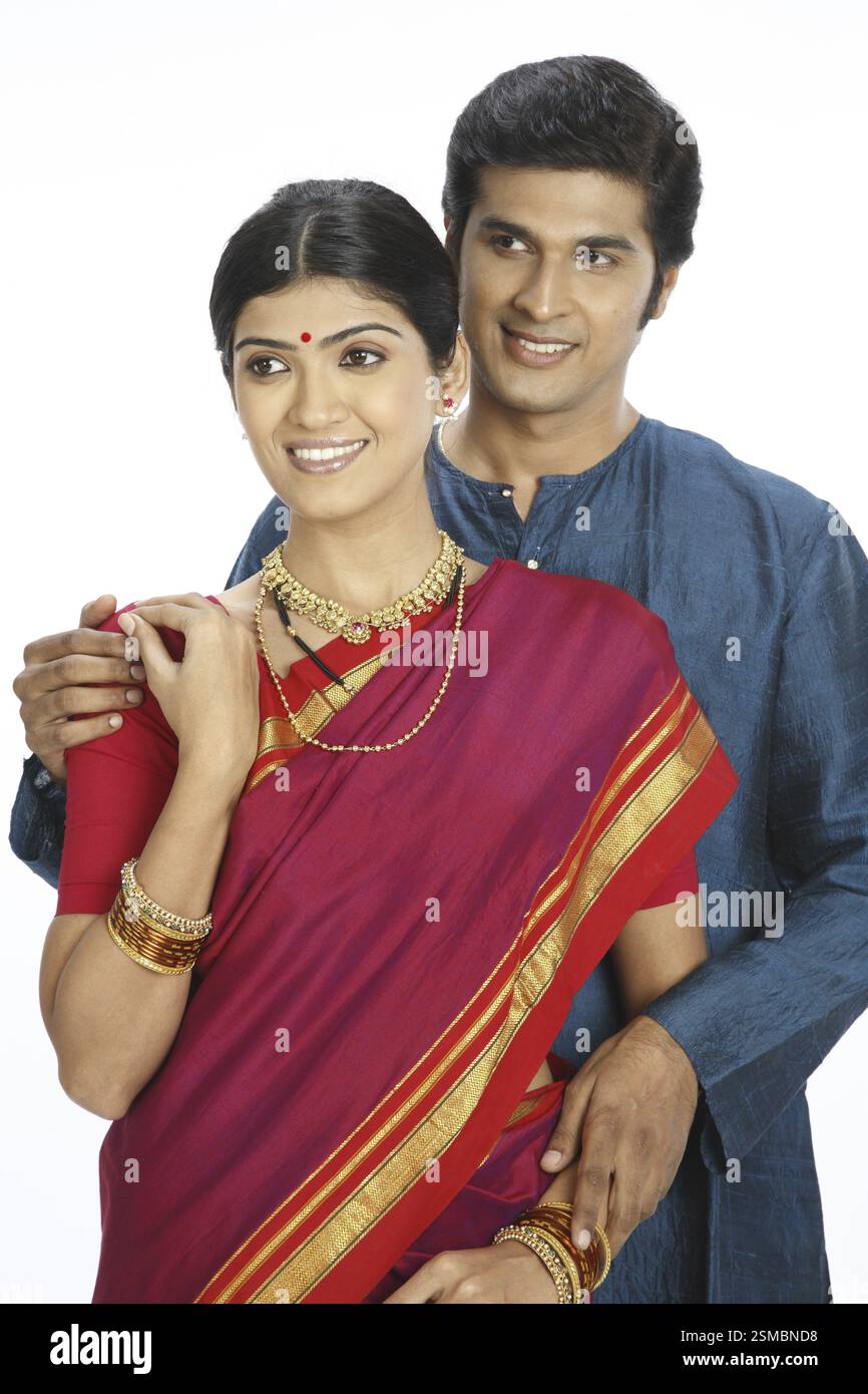 Rich rural farmer behind his wife standing close to each other MR#743A ...