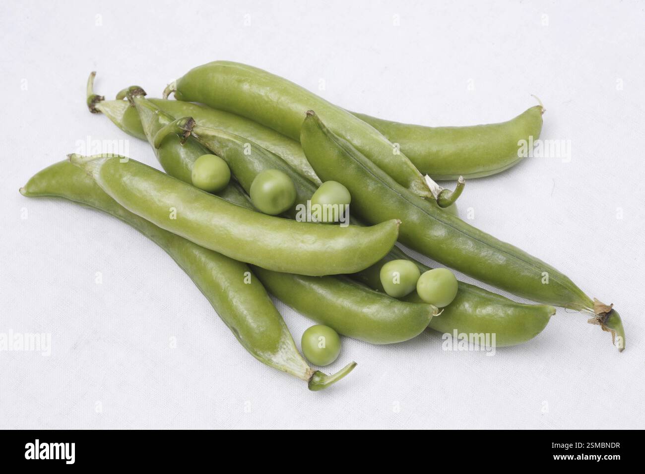 Vegetable, Green Peas pod Pisum sativum with unpeel peas on white ...