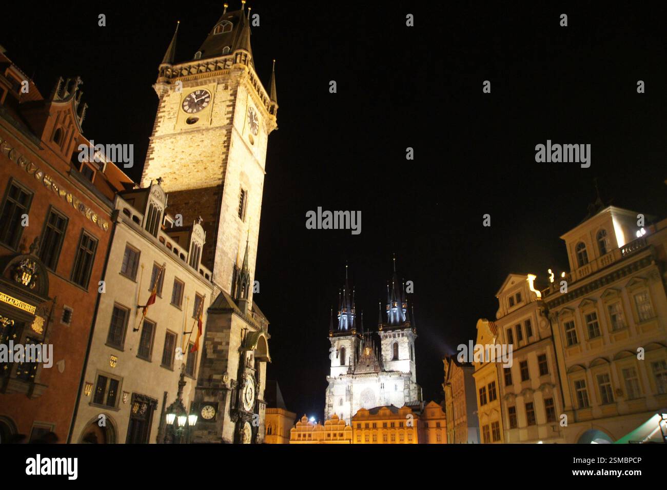 Old Town Square, Prague. Illuminated buildings and spires at night ...