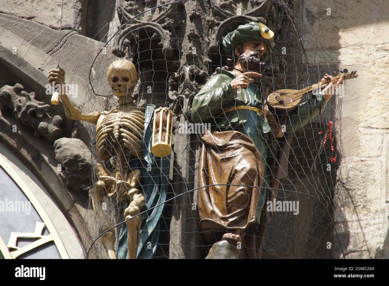 Prague Astronomical Clock. Figures representing Death and Time ...