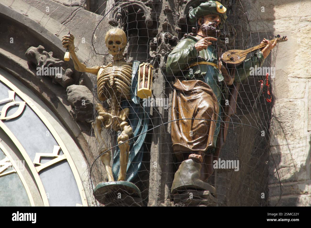 Prague Astronomical Clock. Figures representing Death and Time ...