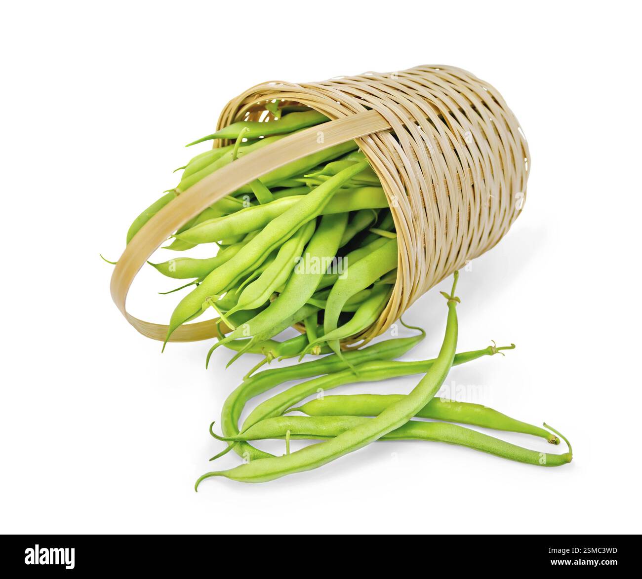 Asparagus green beans in a wicker basket isolated on white background ...